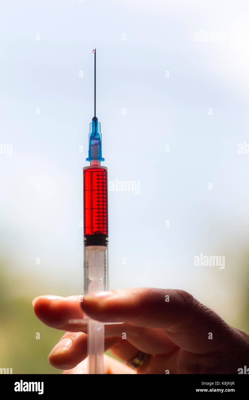 The syringe with the medicine is close-up ready for injection Stock ...