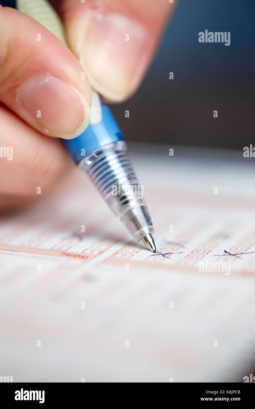 Close-up photo of human's hand with lottery ticket Stock Photo - Alamy