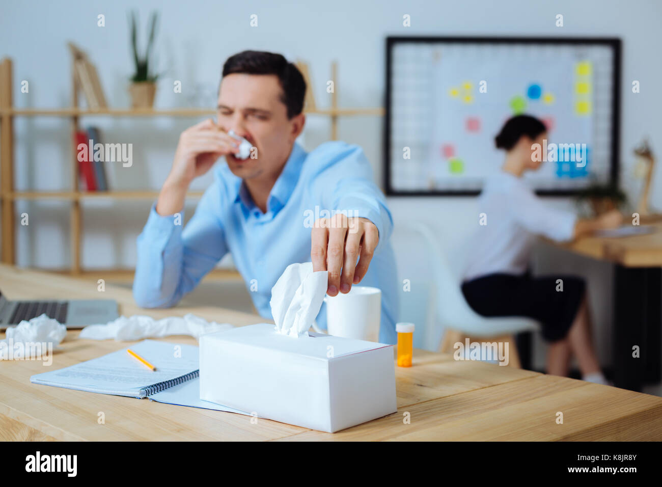 Focused photo on male hand that taking serviette Stock Photo - Alamy