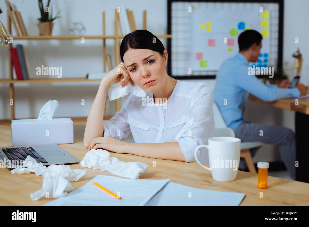 Depressed woman being deep in thoughts Stock Photo - Alamy