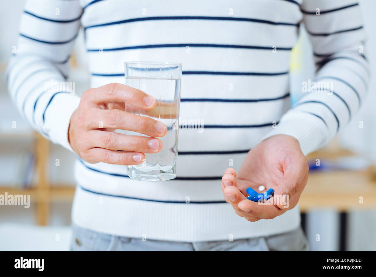 Close up of male hand that demonstrating pills Stock Photo - Alamy