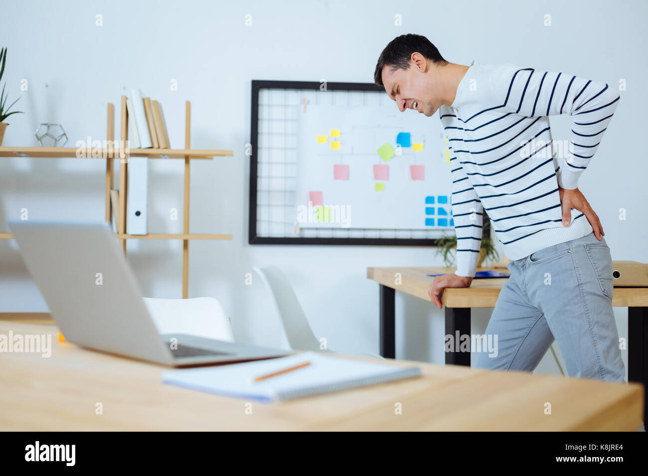 Sick man crying from strong pain Stock Photo - Alamy