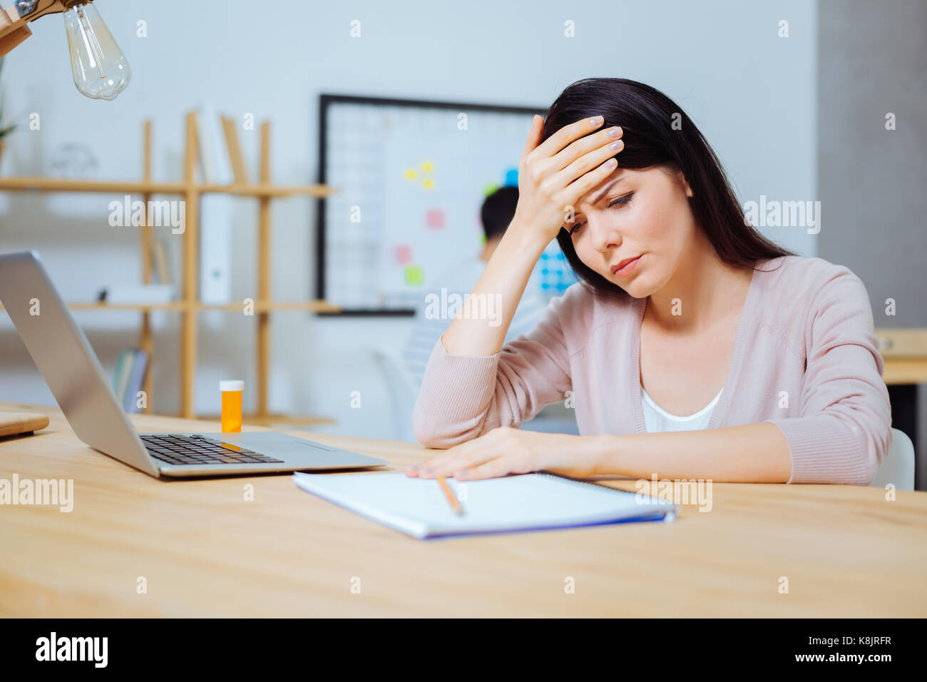 Upset woman having high temperature Stock Photo - Alamy