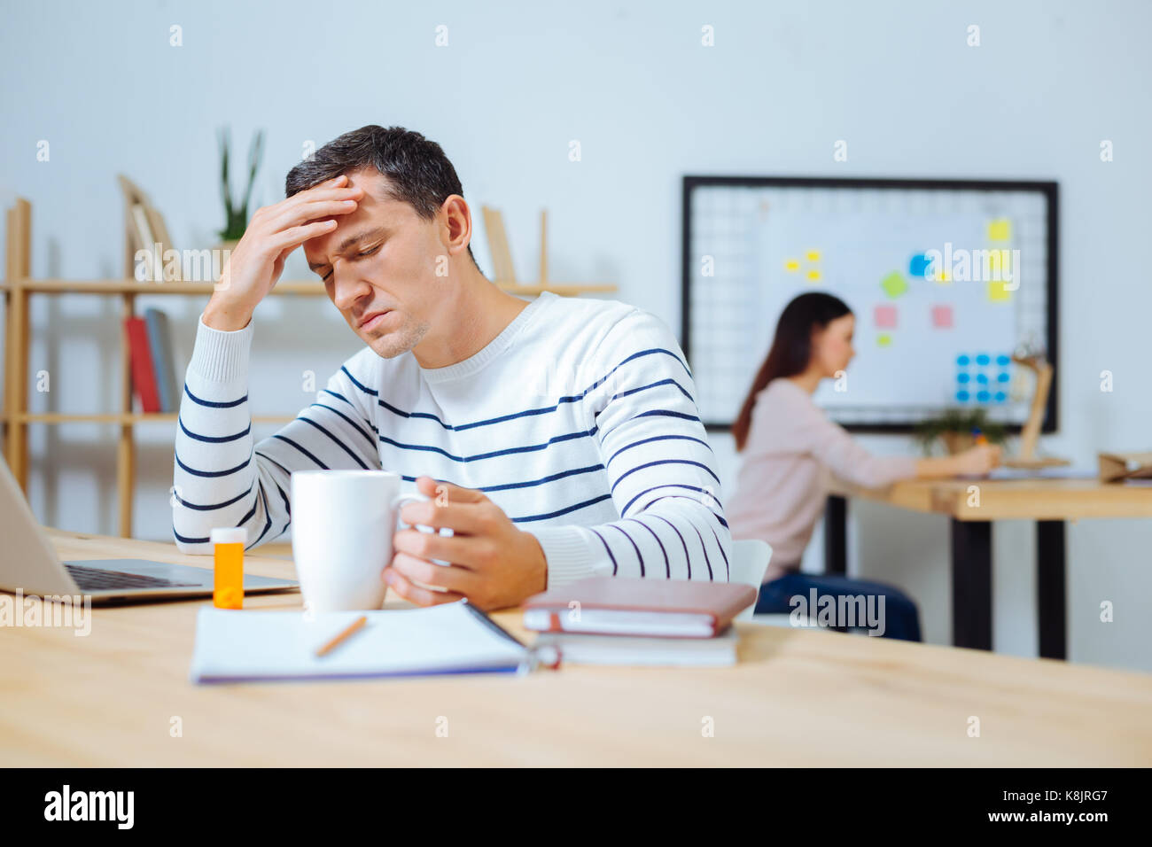 Serious man trying to concentrate on task Stock Photo - Alamy