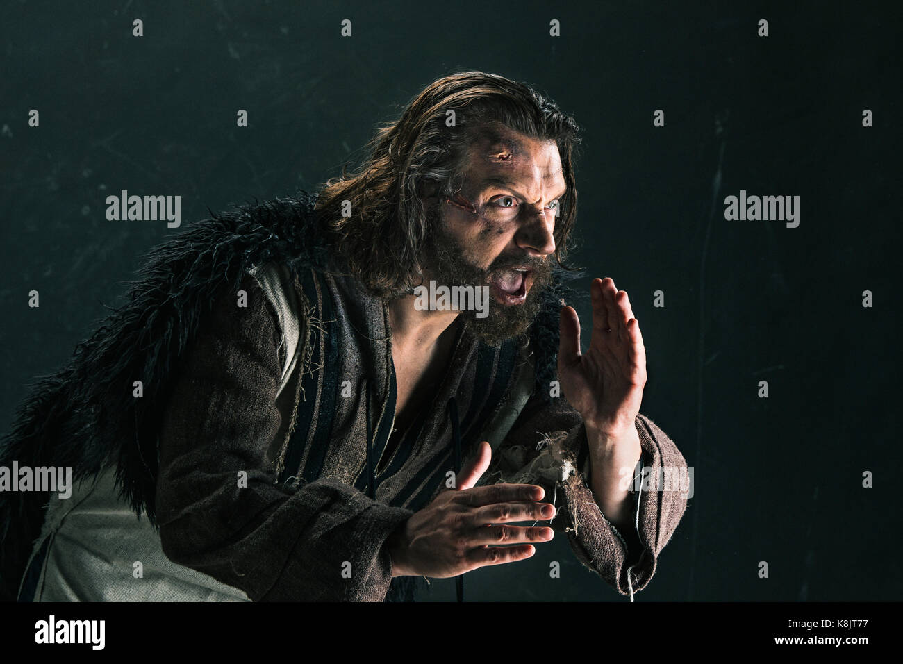 Actor in makeup, a poor man Stock Photo - Alamy