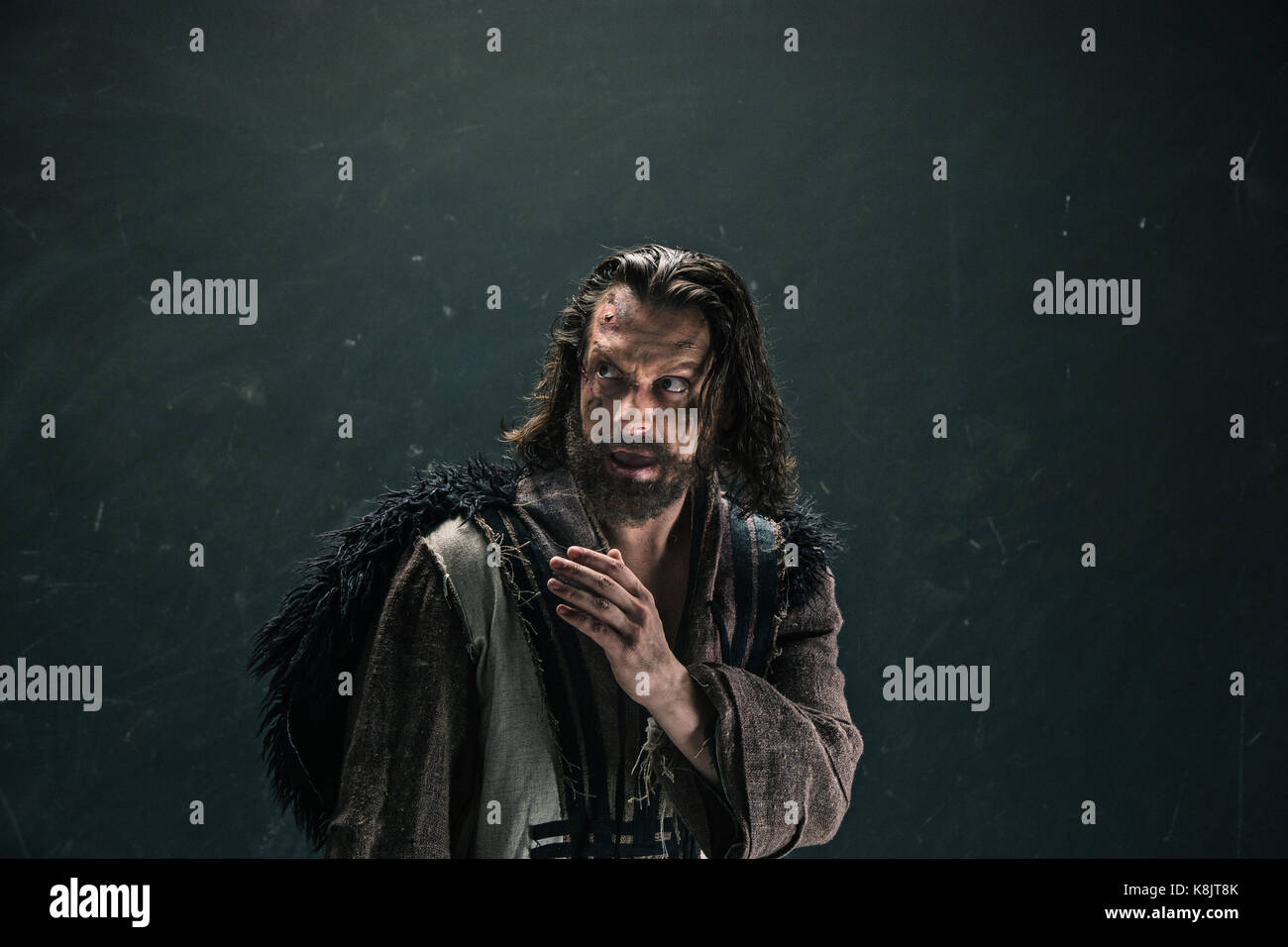 Actor in makeup, a poor man Stock Photo - Alamy