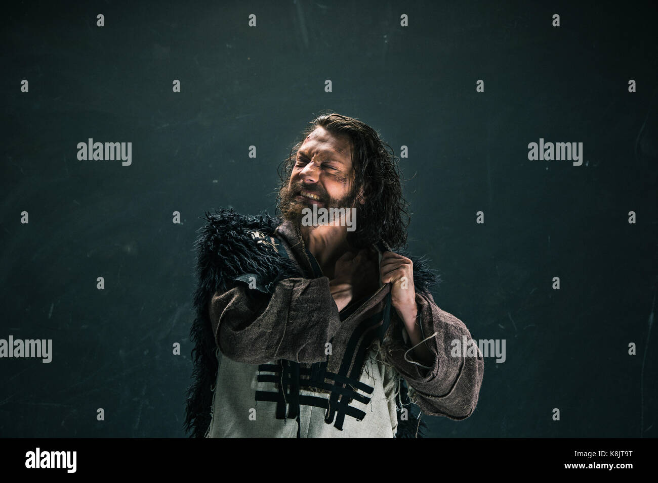 Actor in makeup, a poor man Stock Photo - Alamy