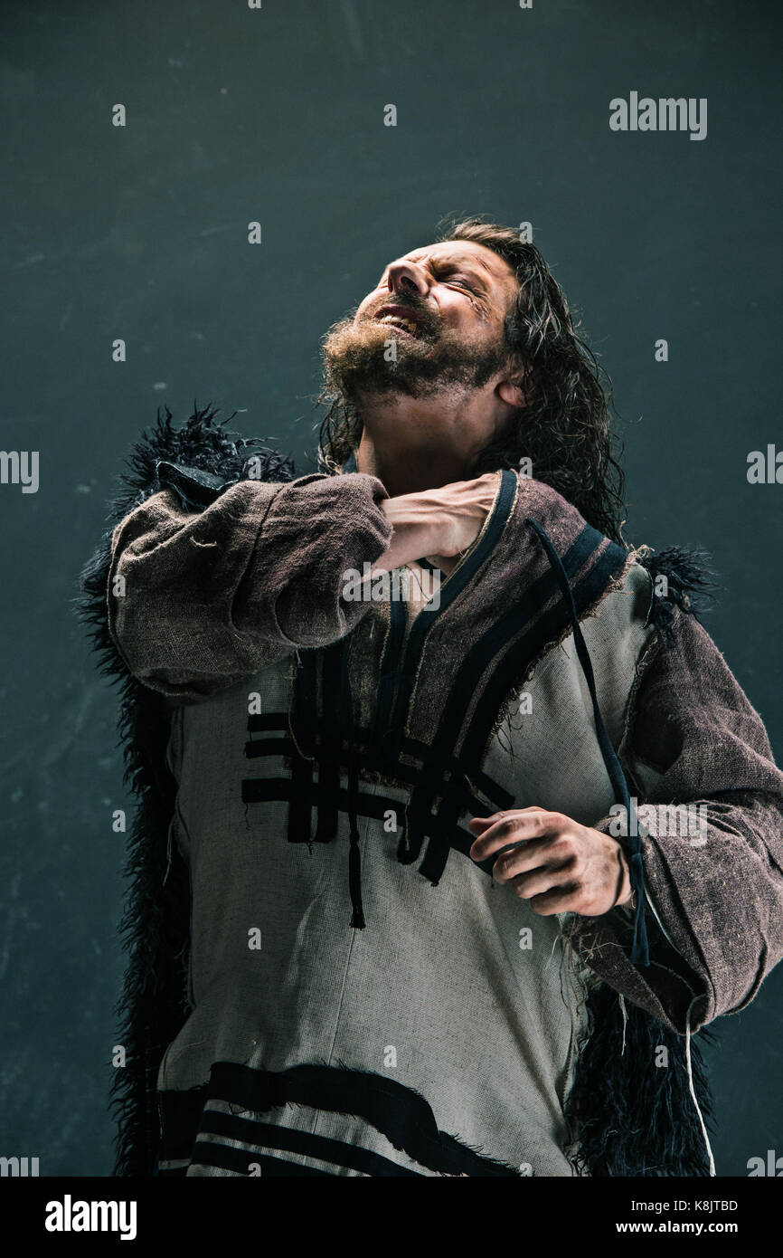 Actor in makeup, a poor man Stock Photo - Alamy