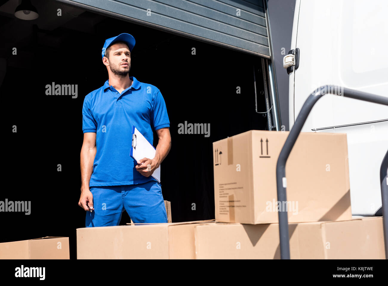 delivery man Stock Photo - Alamy