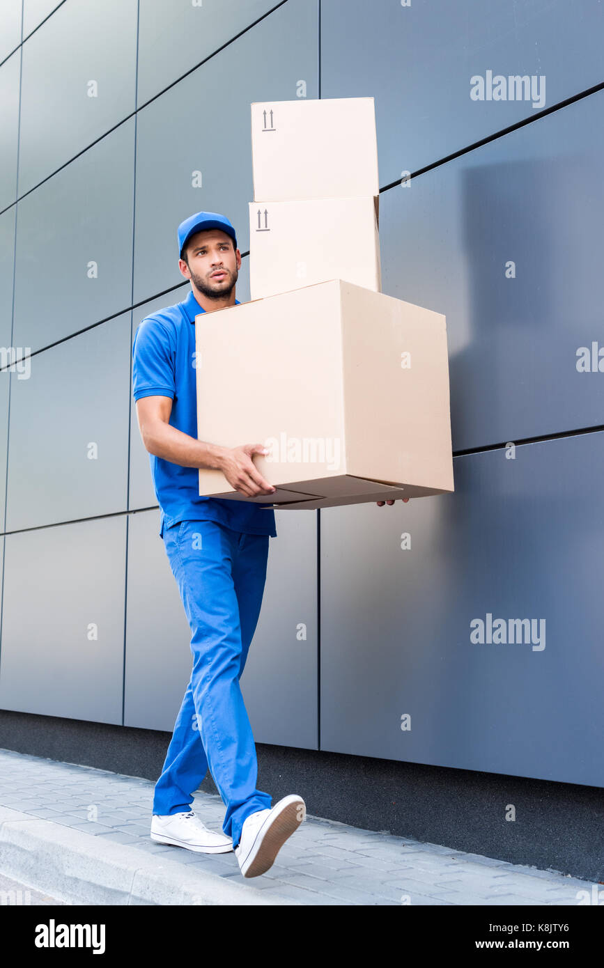 Walking courier hi-res stock photography and images - Alamy