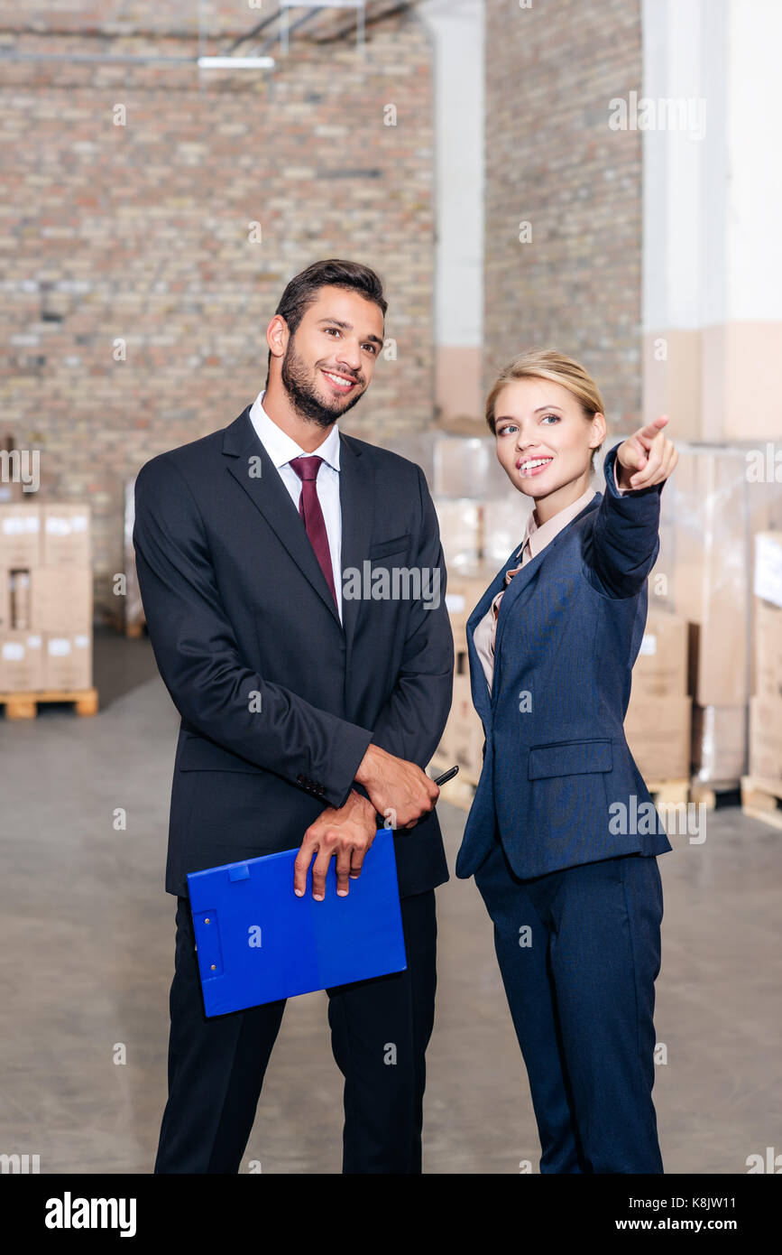 business colleagues at warehouse Stock Photo - Alamy