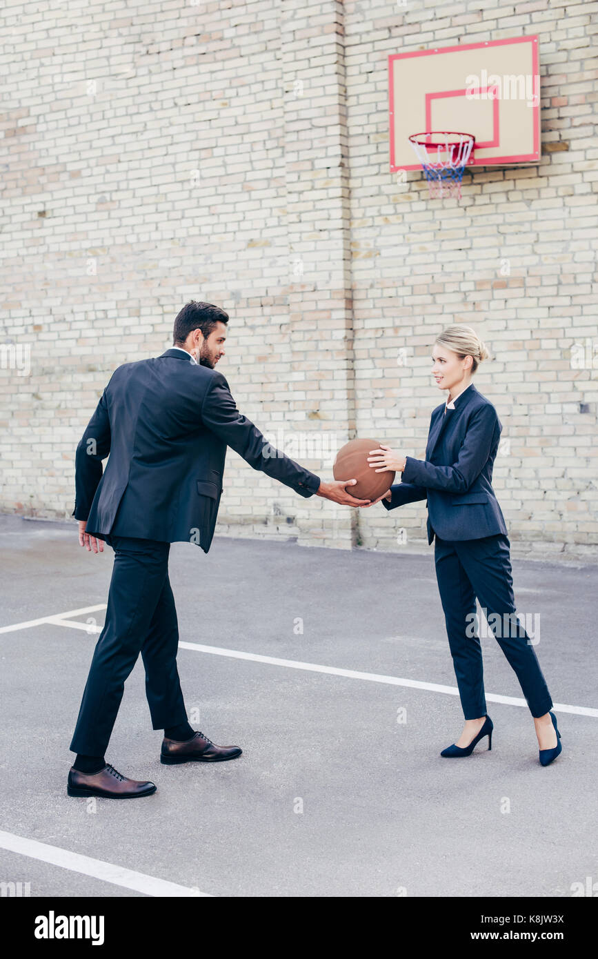 business colleagues with basketball ball Stock Photo - Alamy