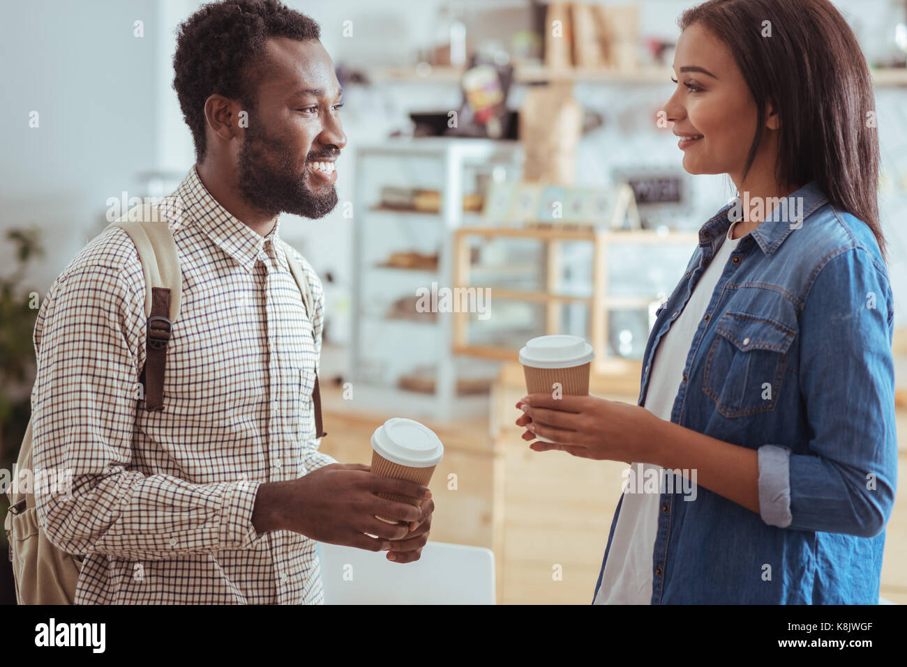 Two best friends drinking coffee in cafe Stock Photo - Alamy