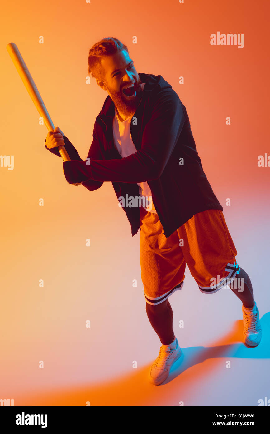 handsome man with baseball bat Stock Photo - Alamy