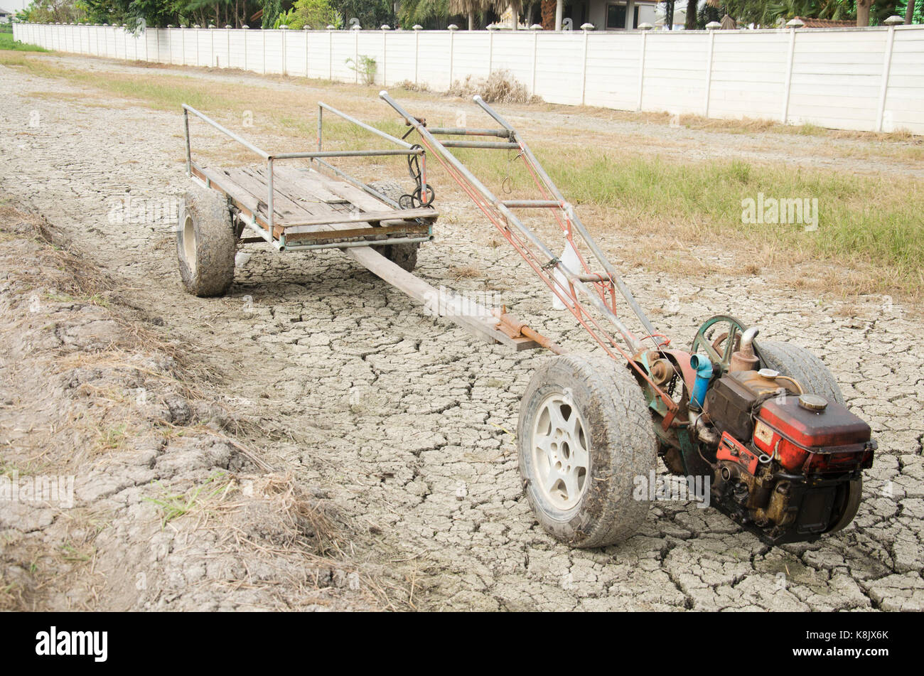 Damage old Tractor and Trailer towing stop on Paddy field wait spring ...