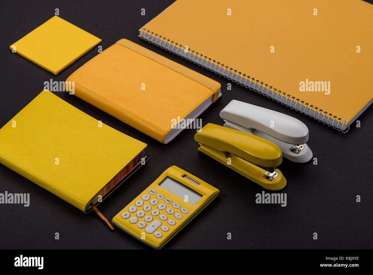 isometric composition of yellow school supplies Stock Photo - Alamy