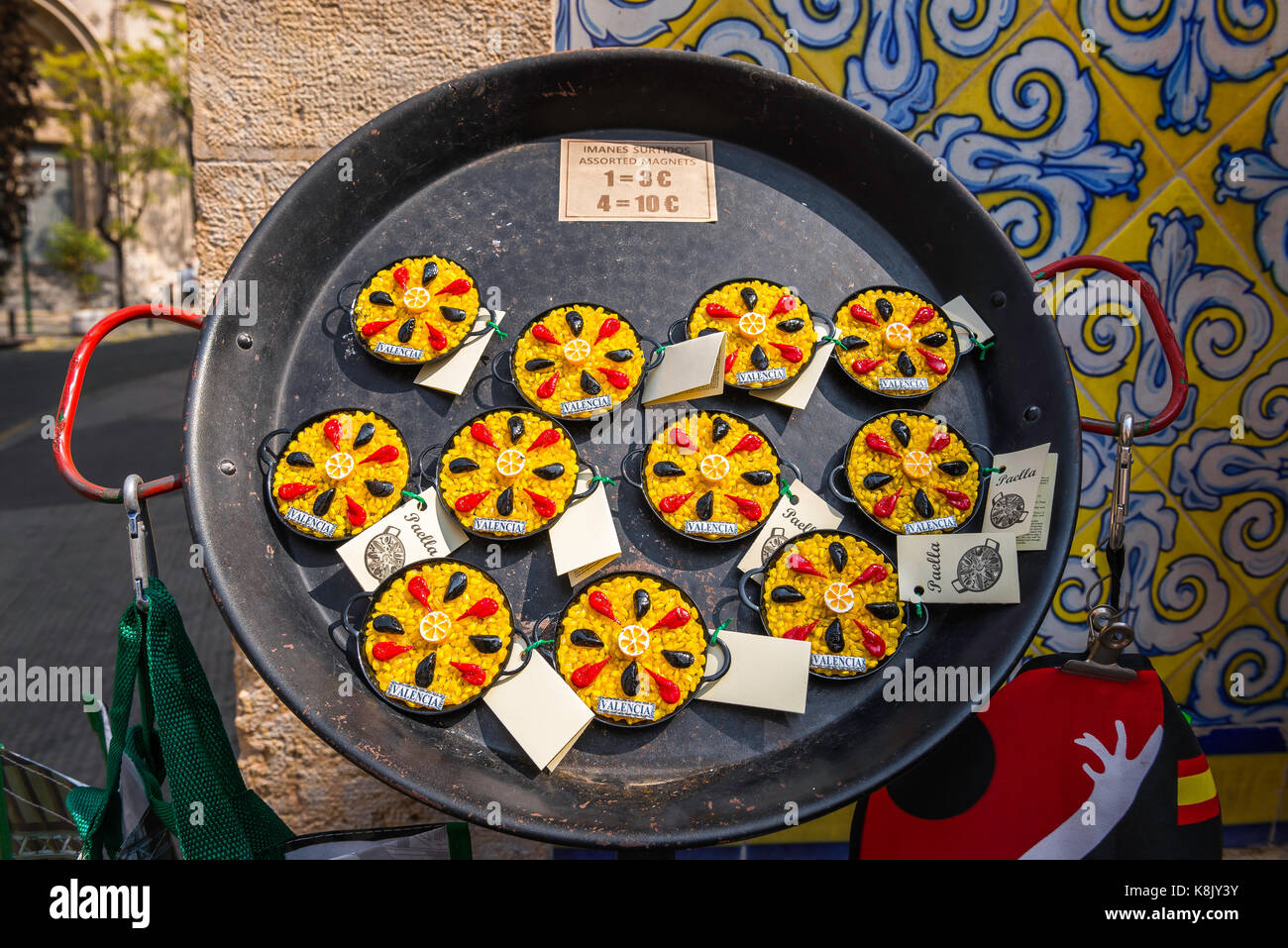 Valencia Spain paella, a display of souvenir fridge magnets in the form ...