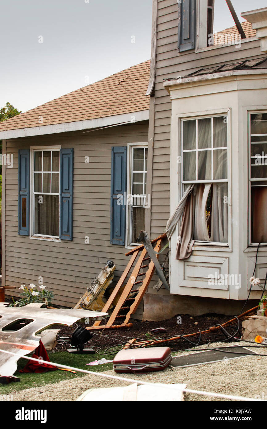 Wooden house damaged by disaster Stock Photo - Alamy