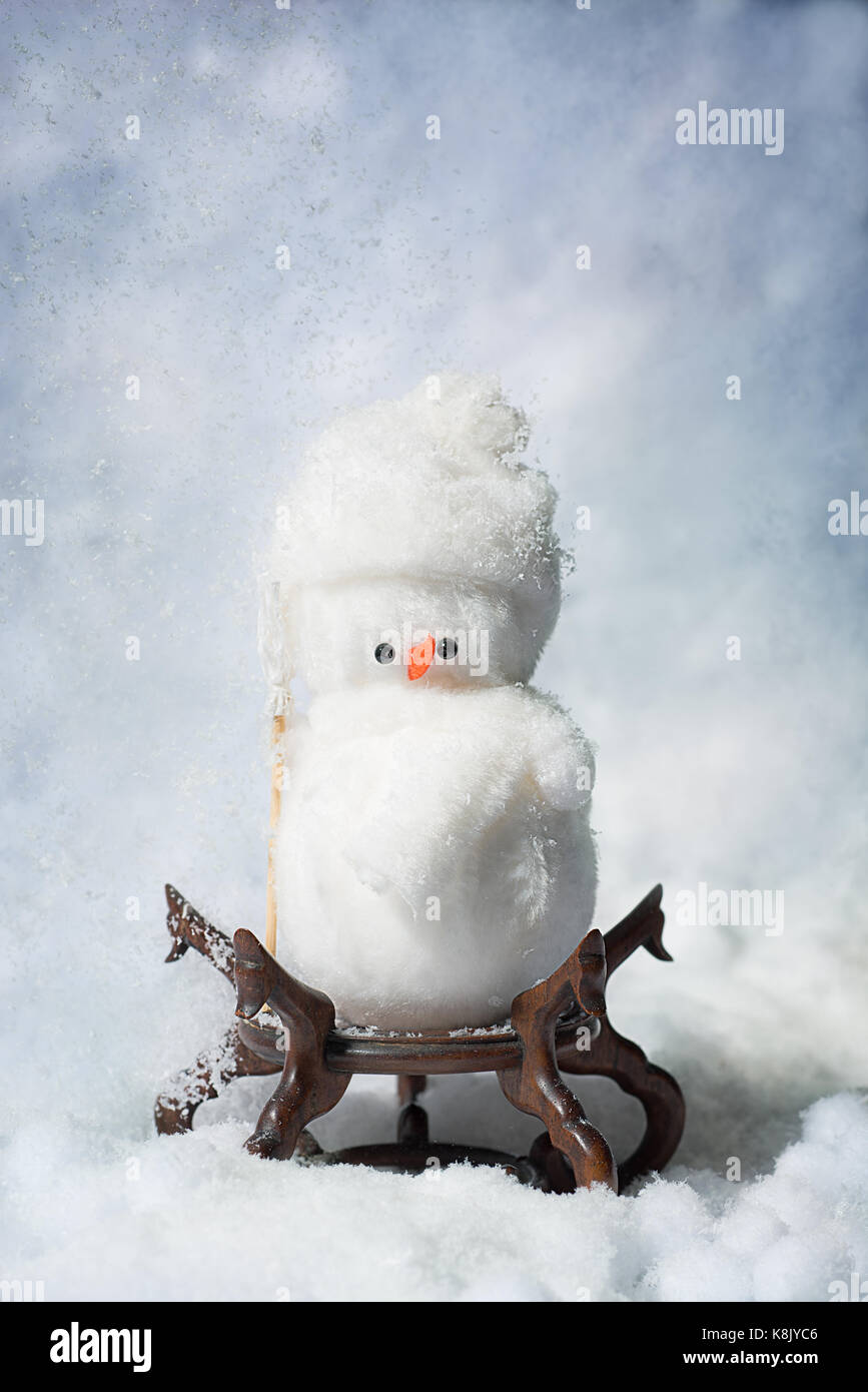 Snowman figure in snow scene for Christmas Stock Photo - Alamy