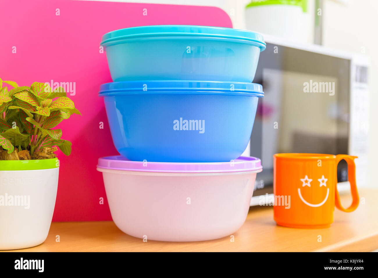 Bright plastic tableware Stock Photo - Alamy