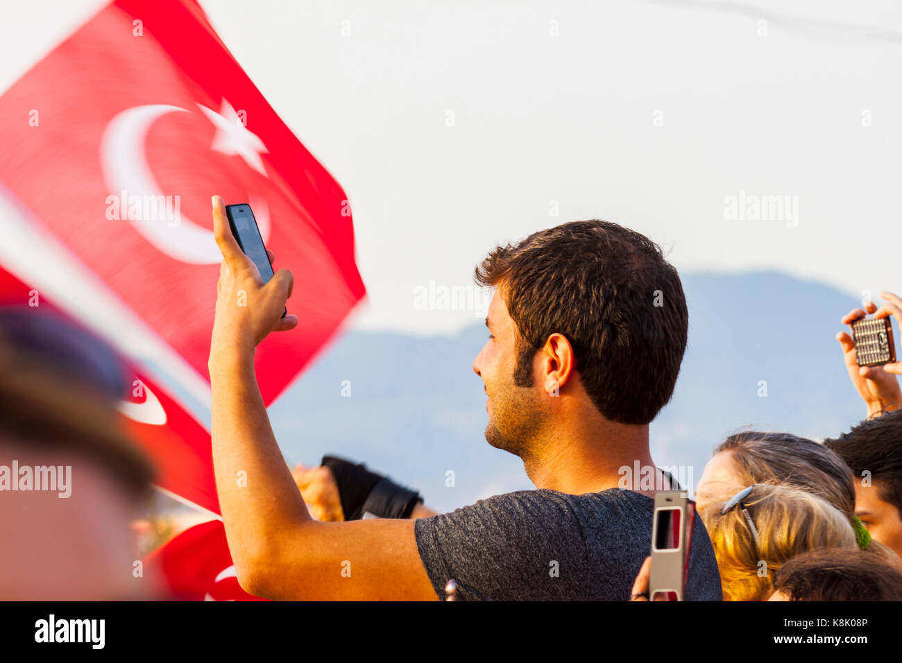 People recording video with smartphone at turkish public event Stock ...
