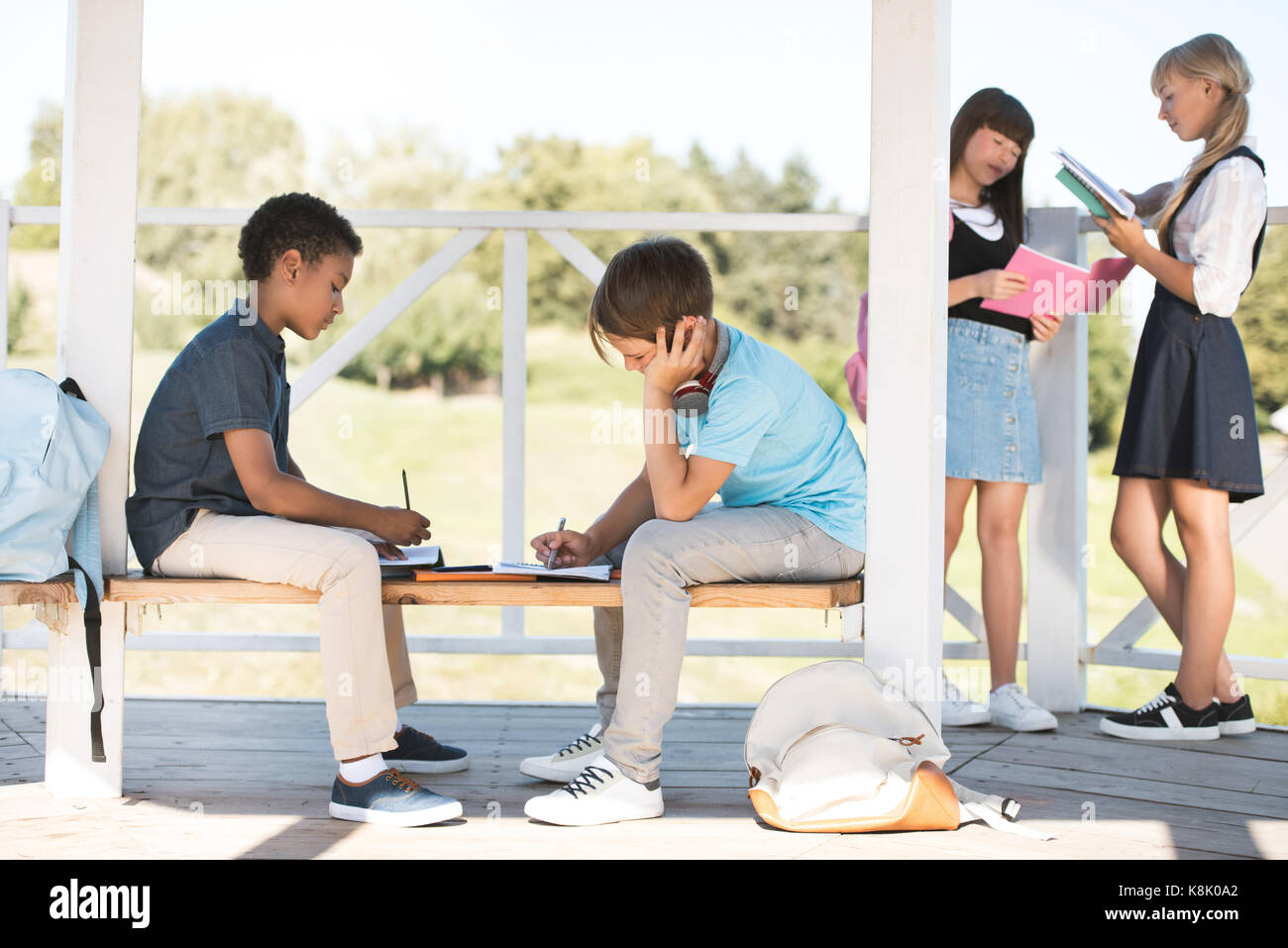 multiethnic teenagers studying together Stock Photo - Alamy