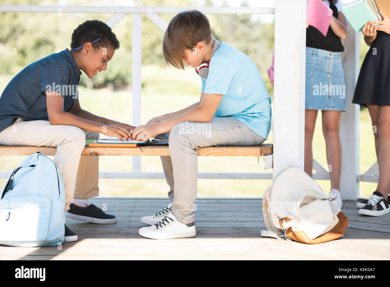multiethnic boys studying together Stock Photo - Alamy