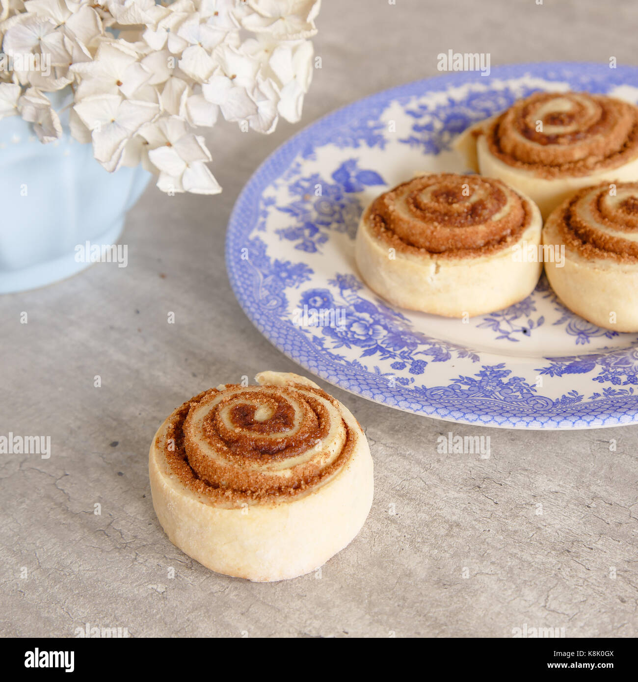 Old fashioned homemade cinnamon buns on an old plate Stock Photo - Alamy