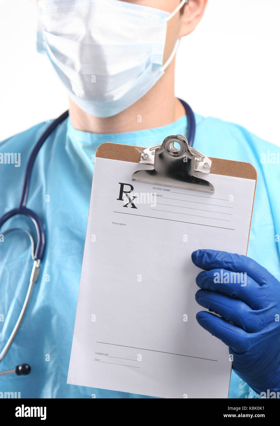 Male doctor standing with folder, isolated on white background Stock ...