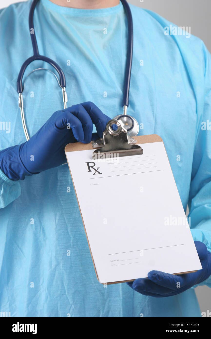 Male doctor standing with folder, isolated on white background Stock ...