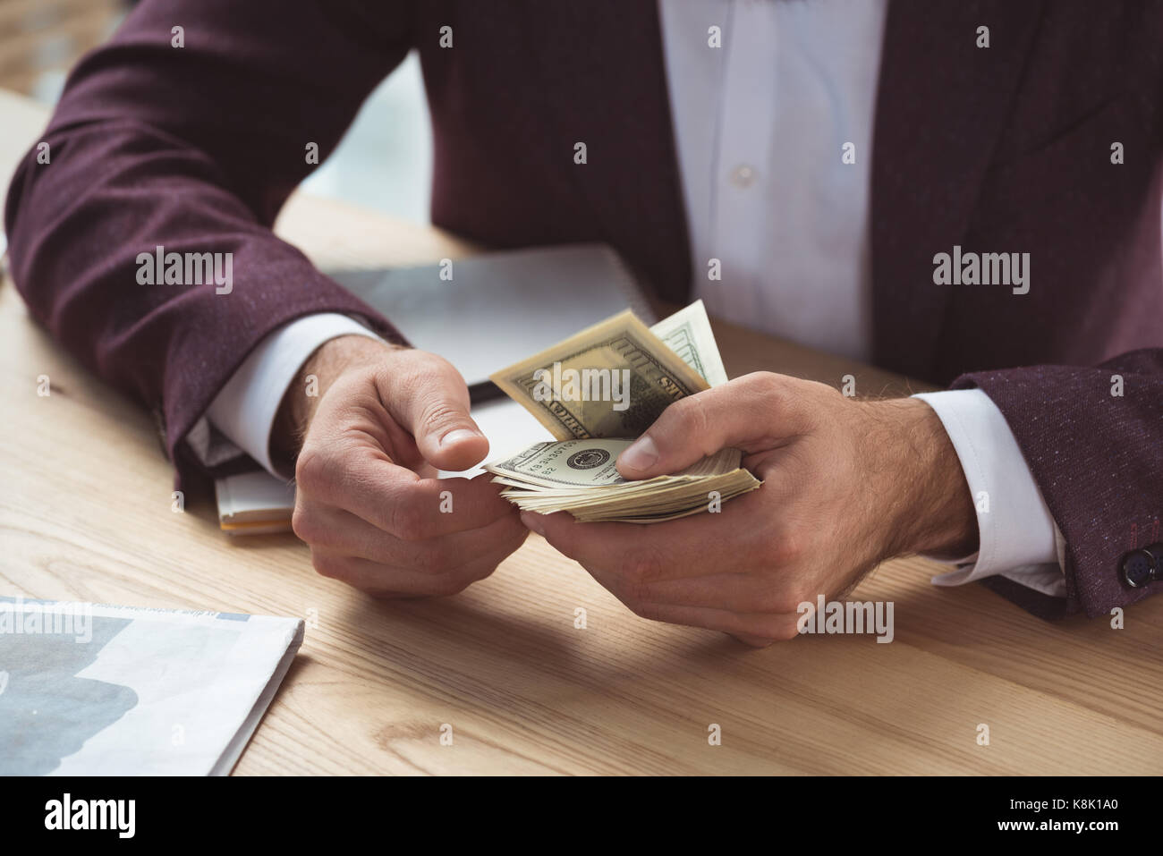 businessman counting dollar banknotes Stock Photo - Alamy