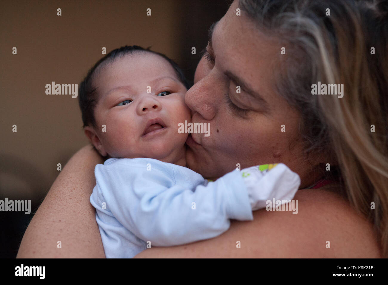 Intertwined arms hi-res stock photography and images - Alamy
