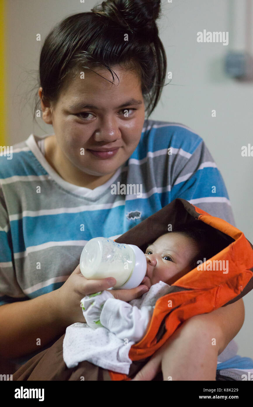 Polynesian woman and baby hi-res stock photography and images - Alamy