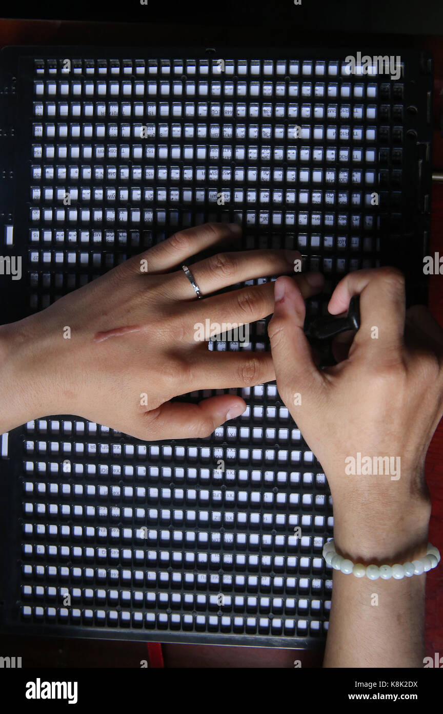 Handicapped children writing hi-res stock photography and images - Alamy