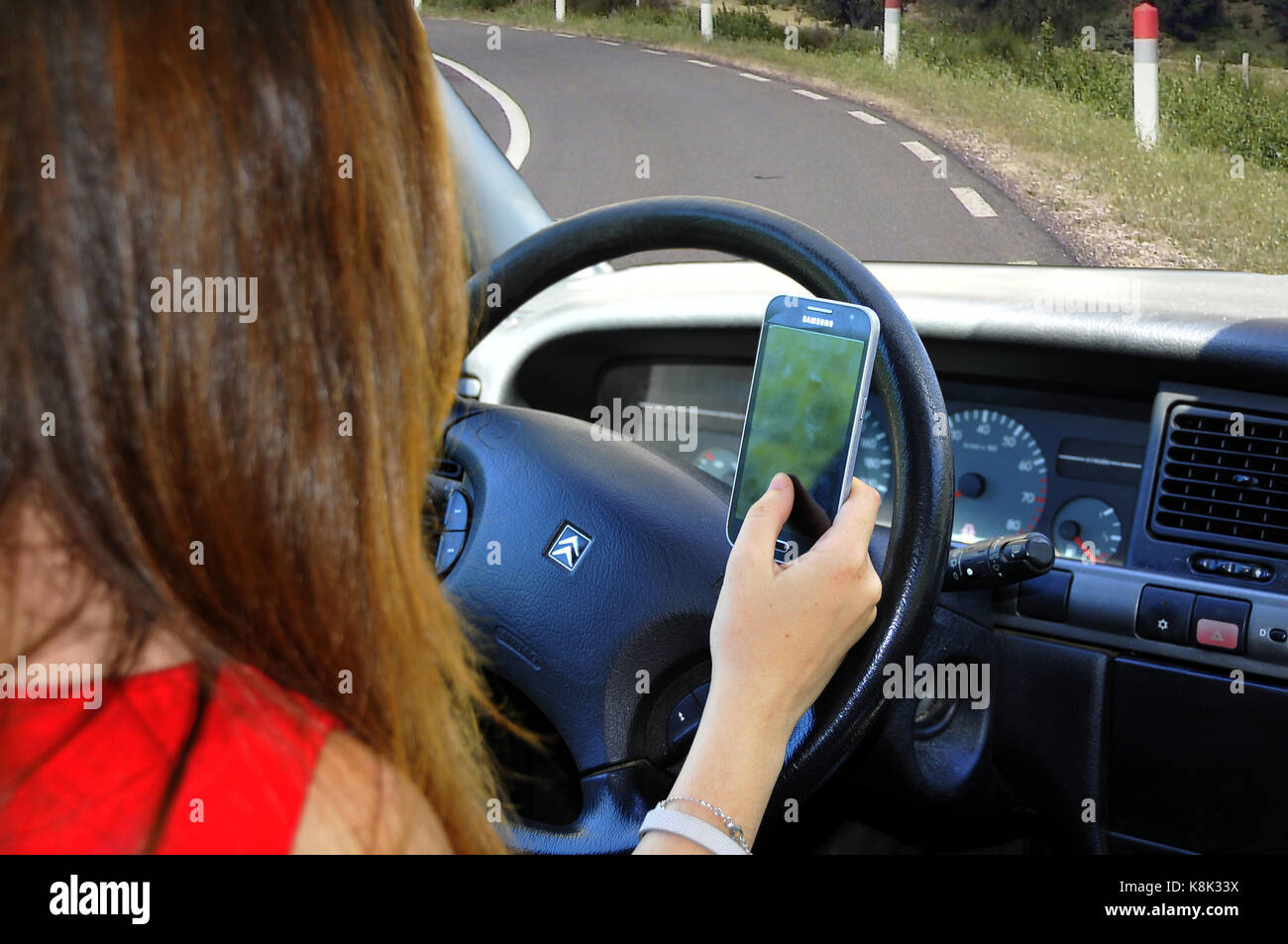 DRIVER WITH PHONE Stock Photo - Alamy