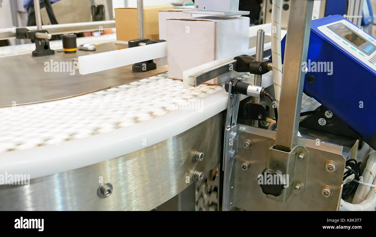 Food factory automated robotic conveyor line Stock Photo - Alamy