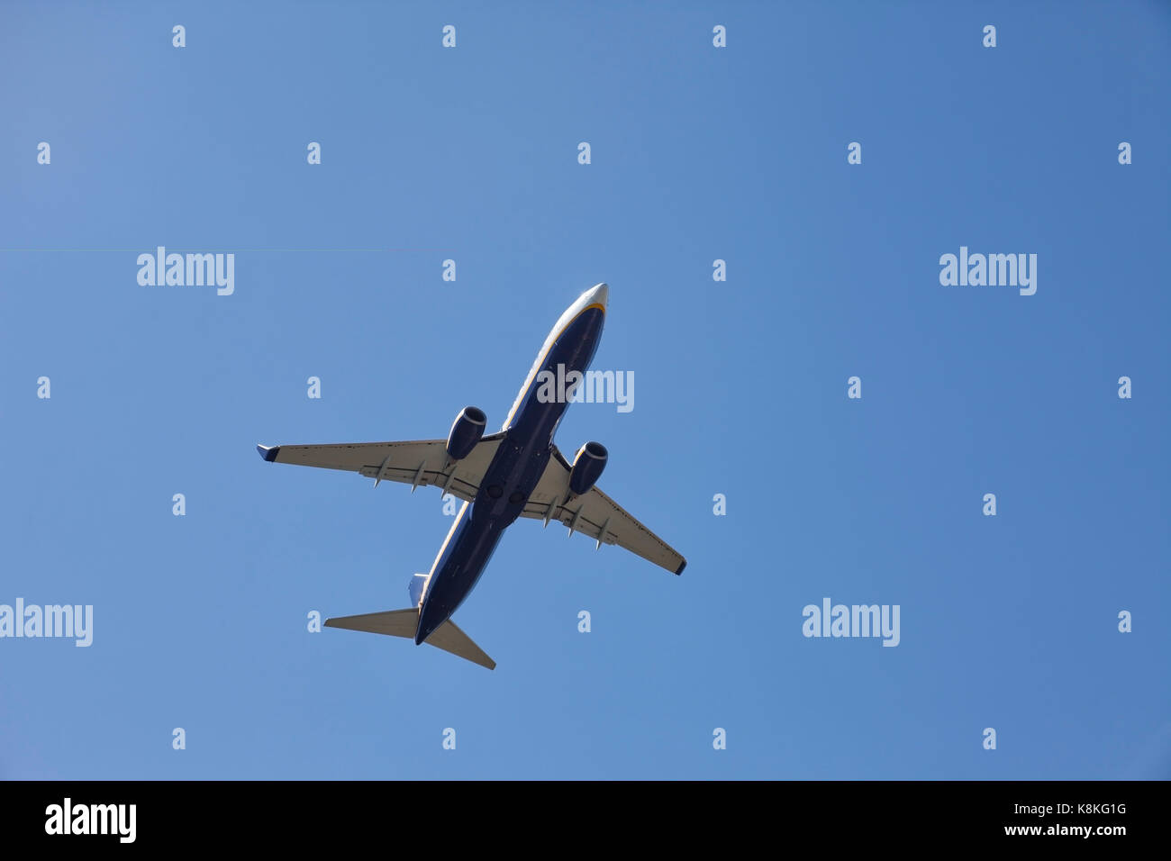 An airplane in flight Stock Photo - Alamy