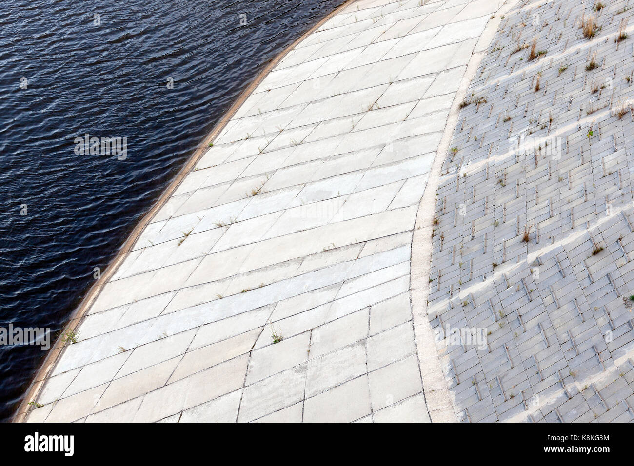 the strengthening of the bridge across the river. visible concrete ...