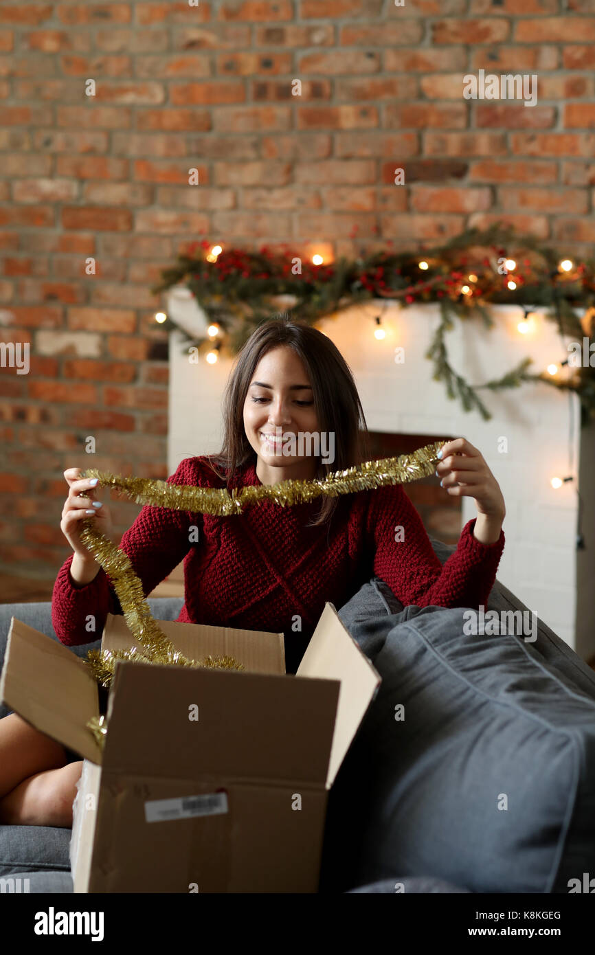 Beautiful woman at Christmas Eve Stock Photo - Alamy