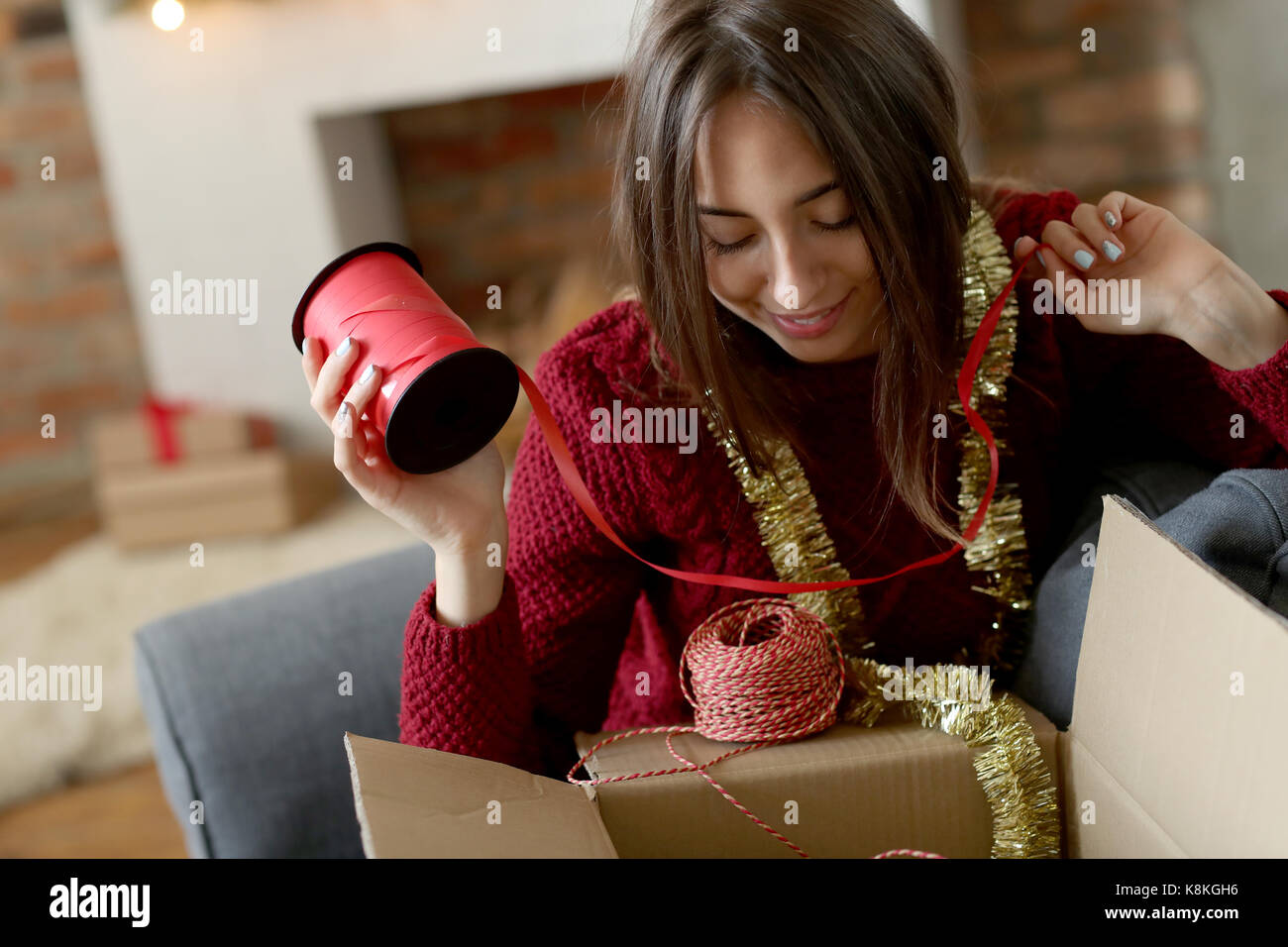 Beautiful woman at Christmas Eve Stock Photo - Alamy