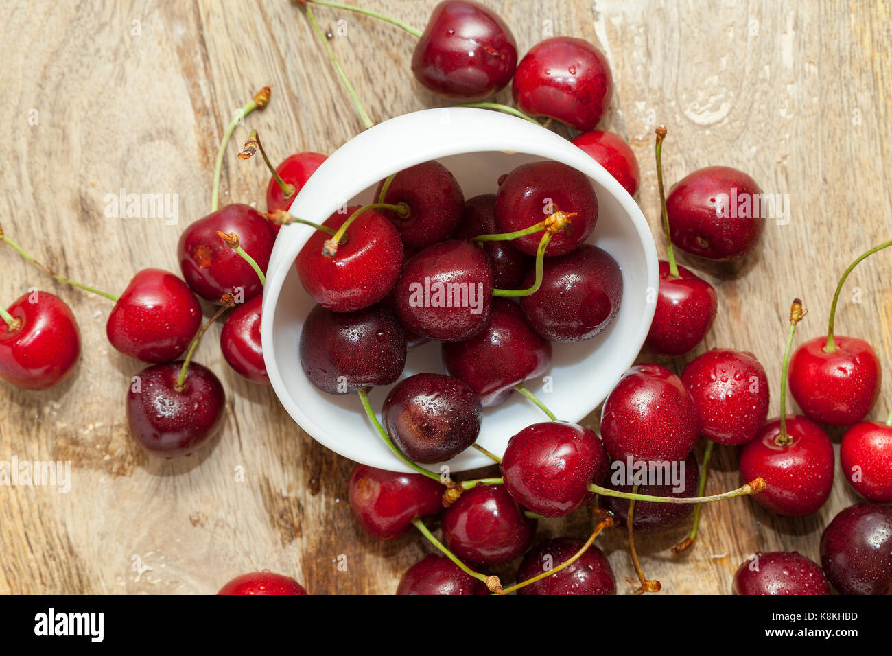 red ripens cherry, ripped from trees during harvest. Photo close up ...