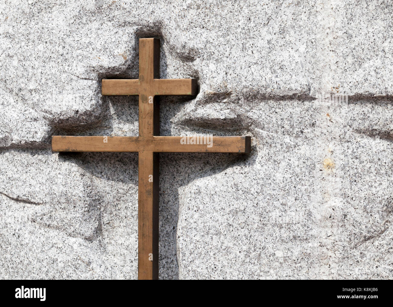 Wooden orthodox cross, fixed on a stone. Photo close up Stock Photo - Alamy