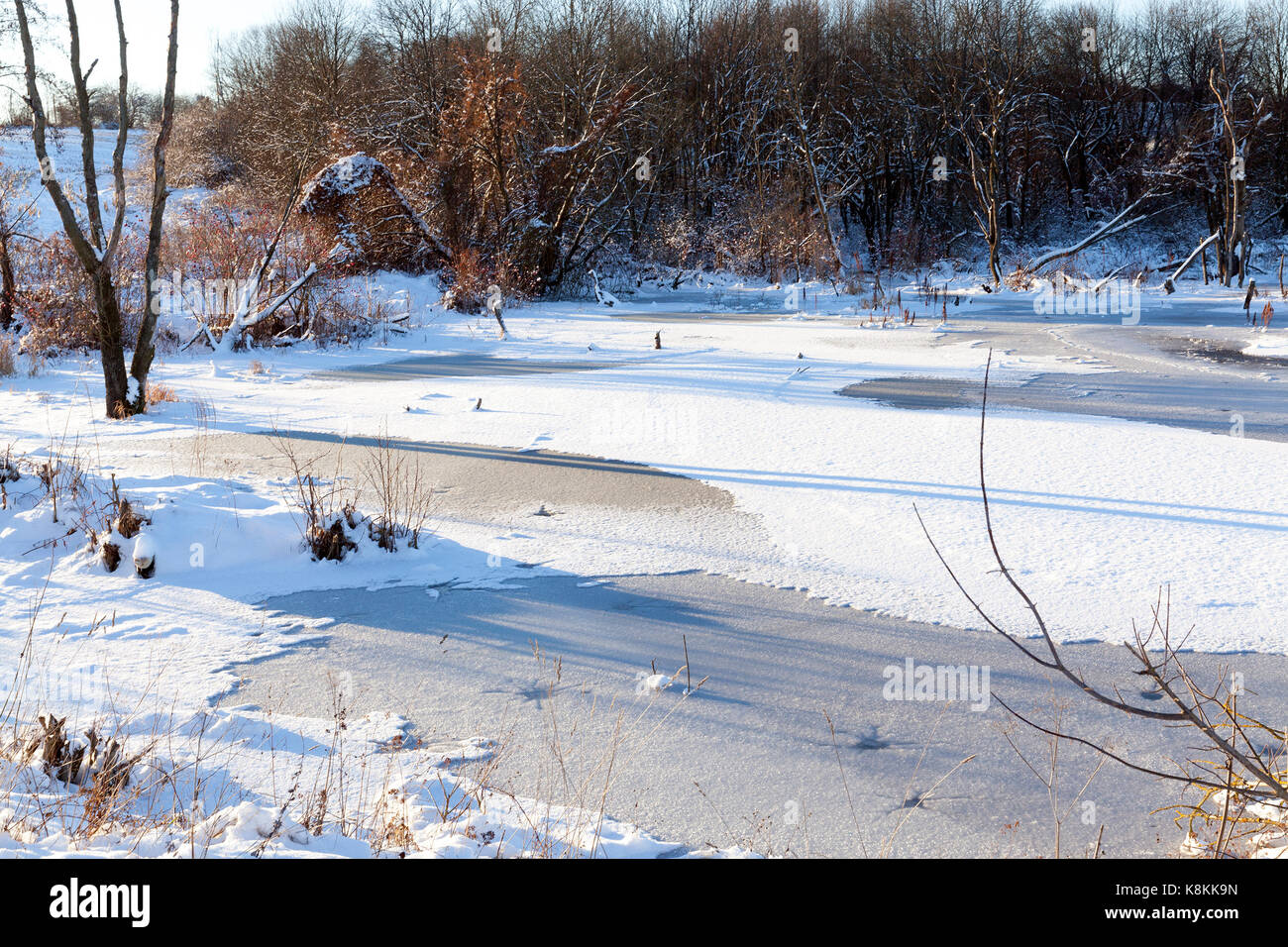 covered lake with ice and snow in the winter season. Photo of landscape ...
