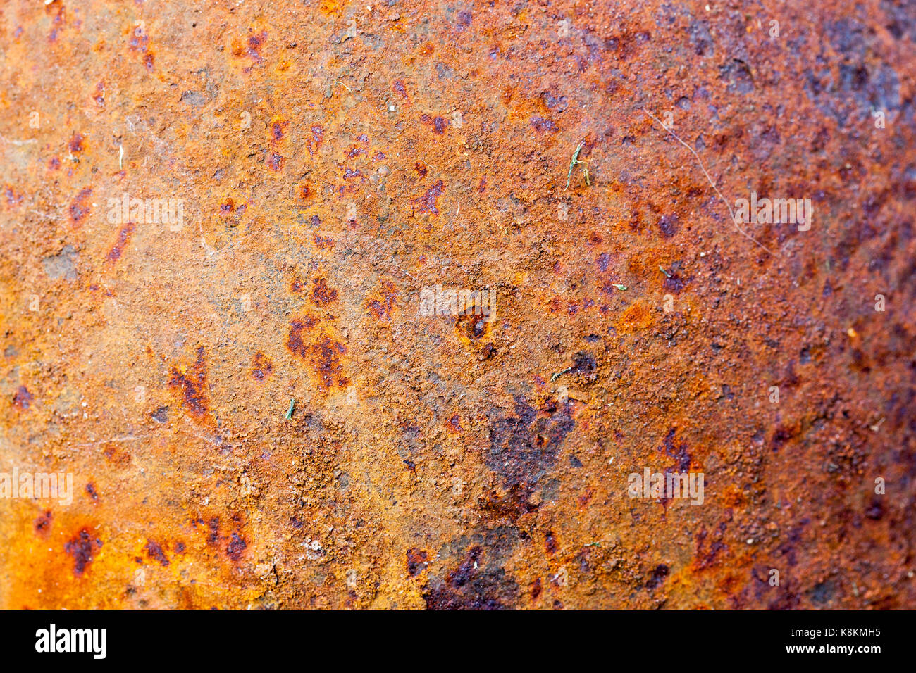 oxidized metal surface from the interaction of iron with water and ...