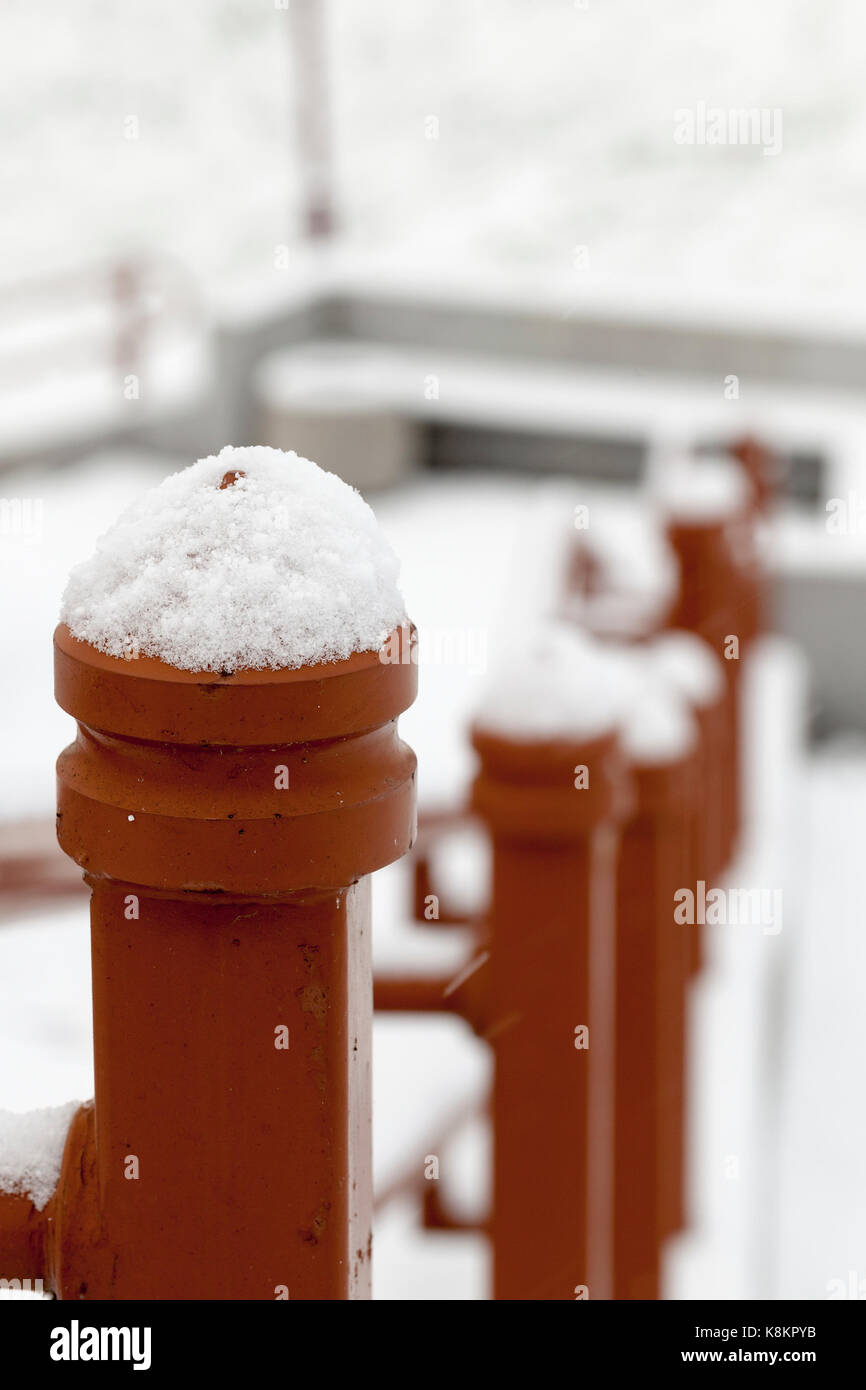 photographed close-up metal railing near the steps. Winter time of the ...