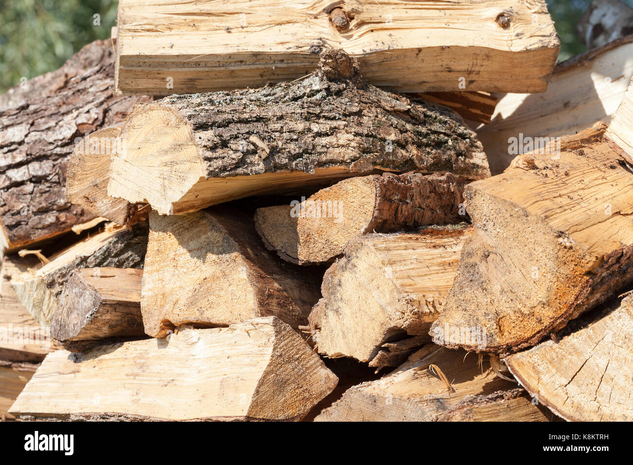 folded in a number of chipped wood firewood. Photographed close-up ...