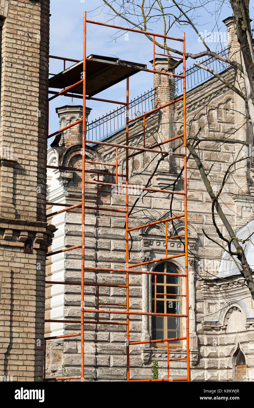 Scaffolding during the reconstruction and repair of the old building ...