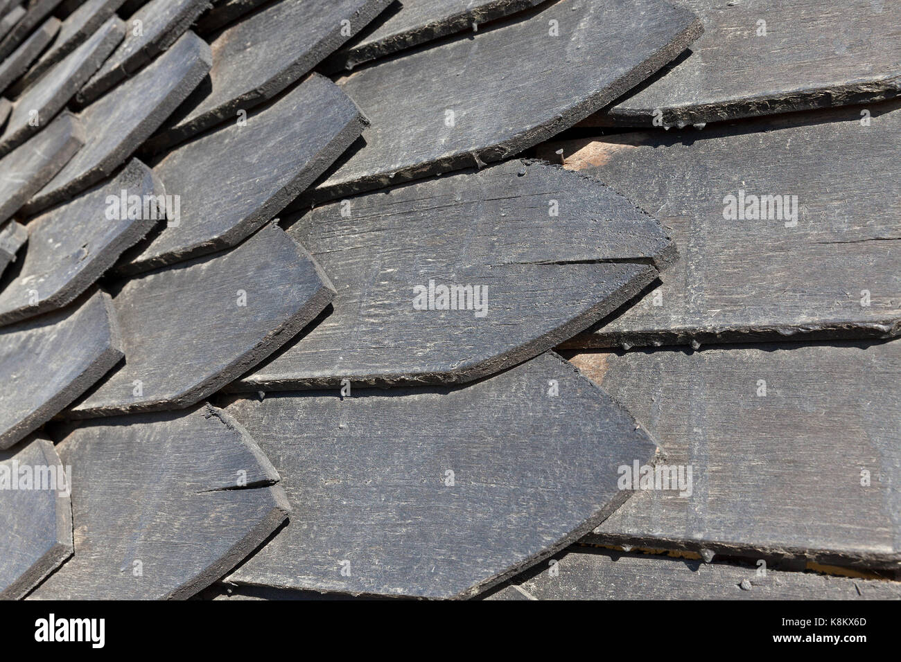 wall made of small boards with pointed edges. A structure that prevents ...