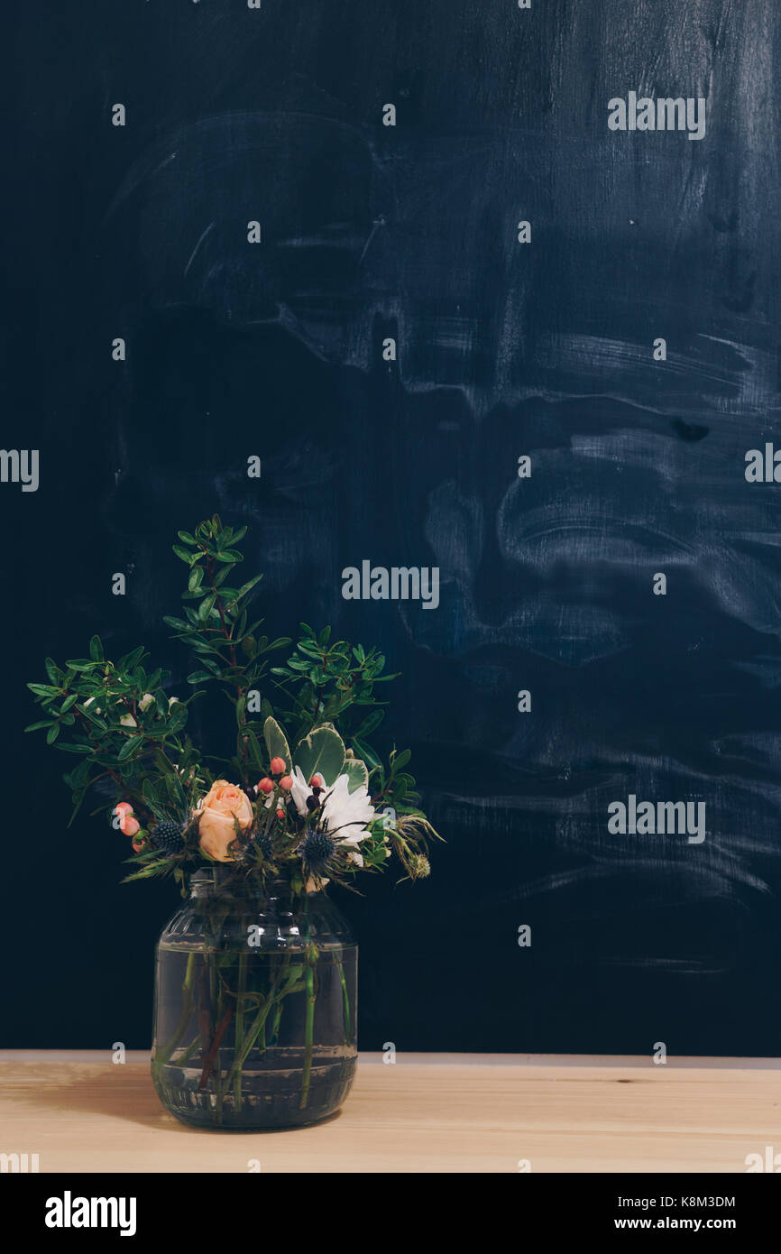 Workplace, study, room with table and blackboard, with flowers Stock ...