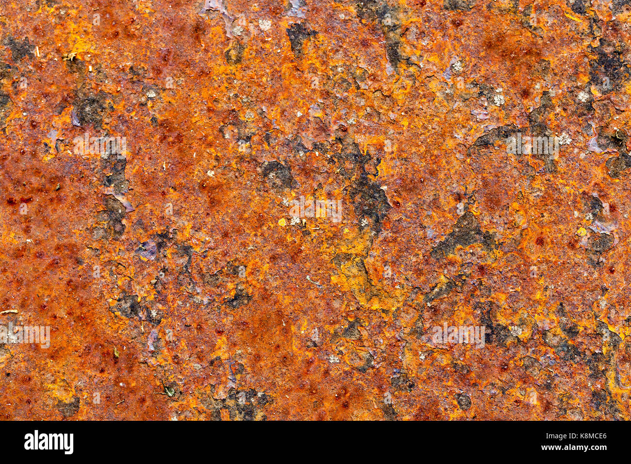 metal surface covered with rust and corrosion from the effects of ...